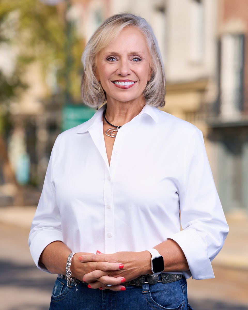 About Lisa Moss | Evans Real Estate | The Moss Realty Group